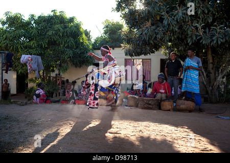 During sangoma initiation ceremony girls chant dance in hut in Peernars ...