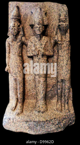 The god Osiris between her son Horus, the falcon-headed, and a king ...