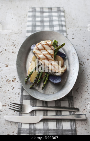 Asparagus on a metal plate Stock Photo - Alamy