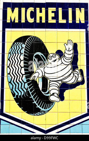 Vintage poster for Michelin tyres with Michelin Man running with car ...