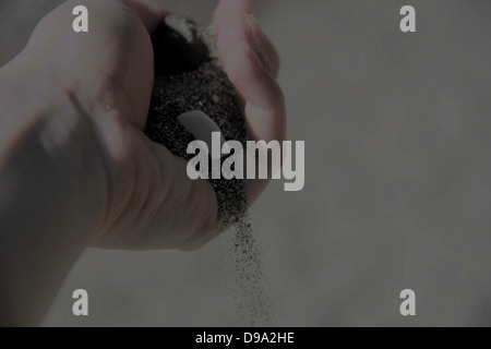 Sand grains falling Stock Photo - Alamy