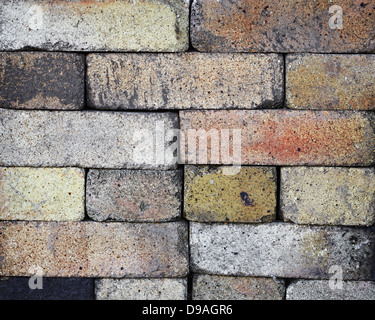 Pile of new bricks stacked to build a wall in a building supplies store ...