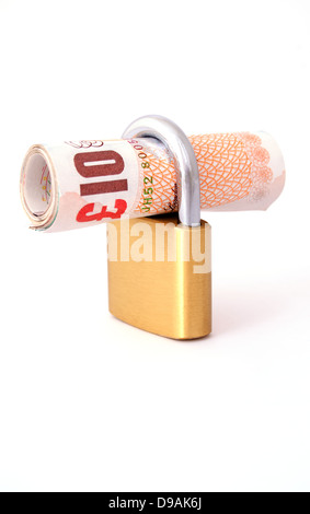 Rolled up ten pound note in a plug hole Stock Photo - Alamy