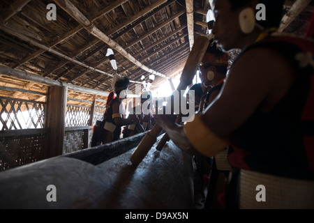 Naga tribal men playing musical instrument, Hornbill Festival, Kohima ...
