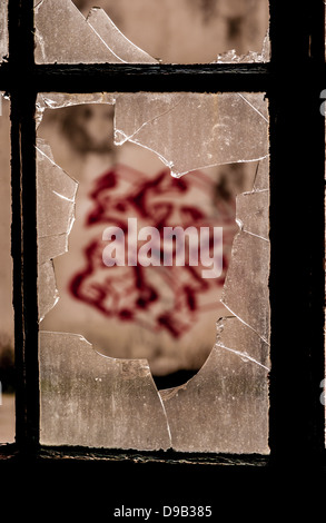 The broken windows of a derelict factory building Stock Photo - Alamy