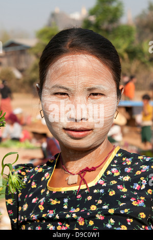 Burmese Girl with traditional face paint made from the thanaka plant ...