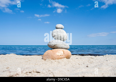 stone pile on beach Stock Photo - Alamy