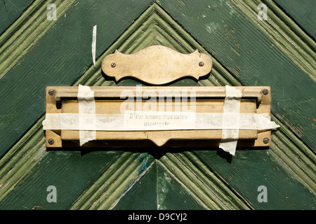 Old letter slit in a door Stock Photo - Alamy