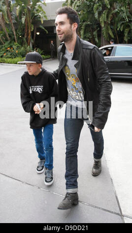 Adam Levine and his son Celebrities attend an LA Lakers game at the ...