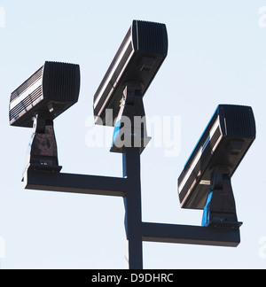 City surveillance cameras. Three cameras looking in different ...