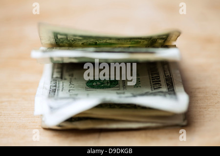 Money on table Stock Photo - Alamy