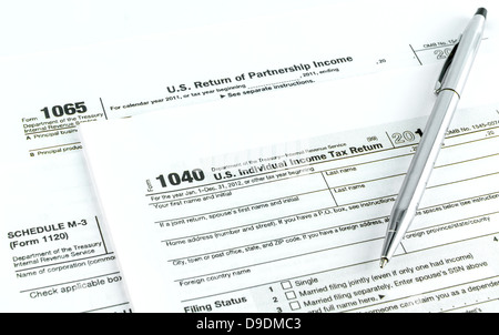 The tax forms 1040,1120,1065. Tax Day concept Stock Photo - Alamy