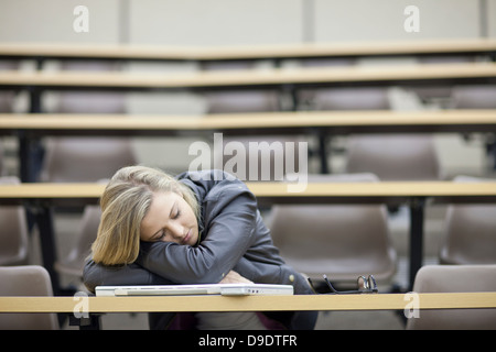 Student sleeping in lecture theatre Stock Photo - Alamy