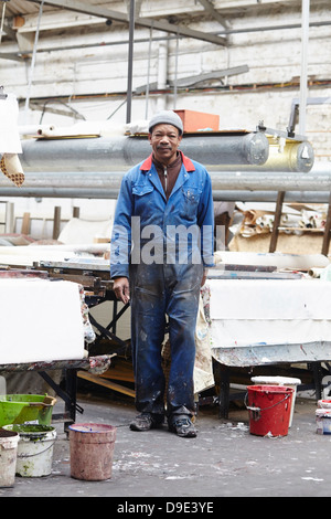 Portrait of man wearing boiler suit in screen printing factory Stock ...