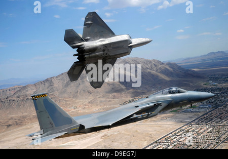 An F-22 Raptor flies over Nellis Air Force Base, Nev., during Red Flag ...