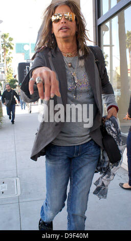 American Idol judge and frontman of Aerosmith Steven Tyler walking ...