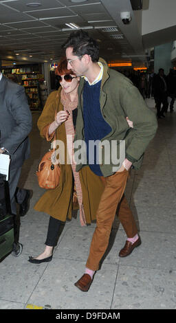 Florence Welch and her boyfriend Stuart Hammond arriving at Heathrow ...