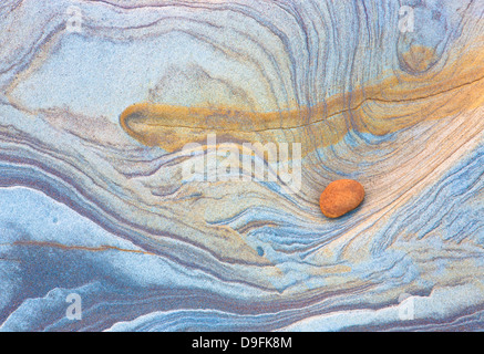 Patterns created by sea erosion on rocks at Rumbling Kern, near Howick ...