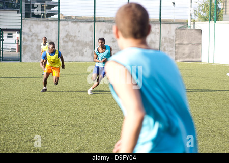 Young Men Playing Soccer Stock Photo - Alamy