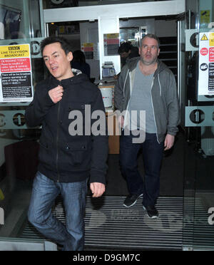 Dave Vitty, aka Comedy Dave, and Chris Moyles congratulate each other ...