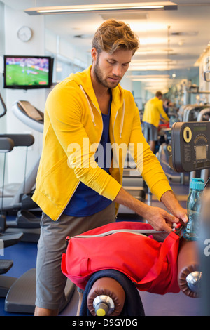 Sports workout in gym, blond girl training in gym Stock Photo - Alamy