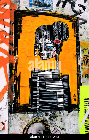 street art portrait by Alo in London with passerby Stock Photo - Alamy
