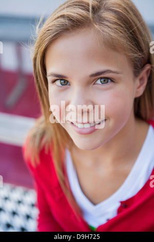 Portrait smiling, confident tween girl eating flavored ice Stock Photo ...