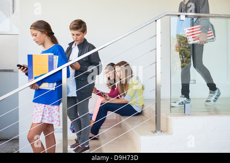Students using electronic gadget in a classroom Stock Photo: 57515823 ...
