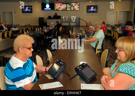 Las Vegas Casino - An Elderly lady plays slot machine Stock Photo ...