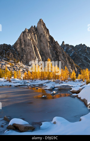 Prusik Peak above frozen Gnome Tarn after an early snow storm ...