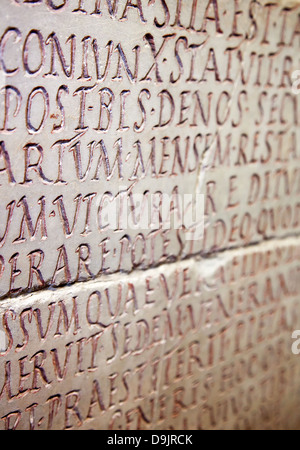 Pre-christian latin writing carved on the tombstone Stock Photo - Alamy