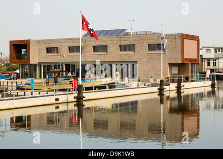 The floating offices of Waternet, in Amsterdam, built to combat sea ...