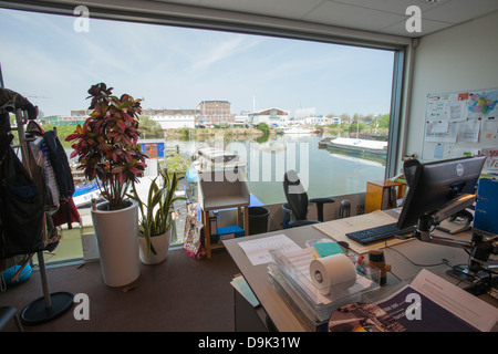 The floating offices of Waternet, in Amsterdam, built to combat sea ...