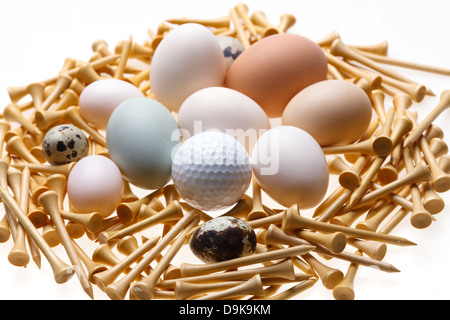 Eggs,golf ball and tees Stock Photo - Alamy