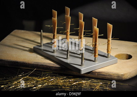 Bassoon reeds on drying rack Stock Photo - Alamy