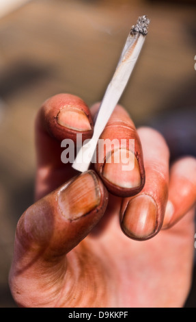 Dirty Nicotine Stained Hand Holding Cigarette Stock Photo - Alamy