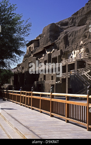 Facade of the Mogao Caves, also known as the Thousand Buddha Grottoes ...