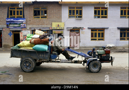 Typical Chinese two-wheel tractor with trailer in the Yunnan province ...
