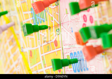 City map filled with pins Stock Photo - Alamy