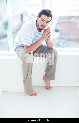 Portrait of anxious nervous bearded man pointing finger on his ...