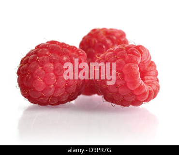 Ripe red raspberries isolated on white background Stock Photo - Alamy