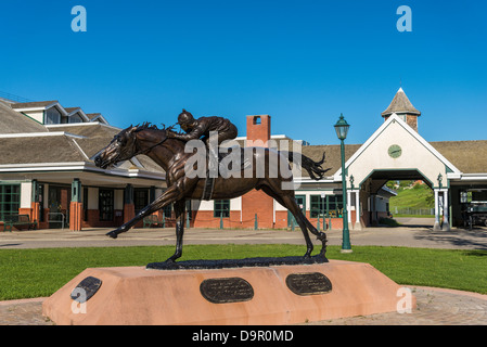 Statue of Jockey, George Woolf, riding 'Sea Biscuit" The Remington ...