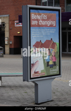 Changing billboard advertising Stock Photo - Alamy
