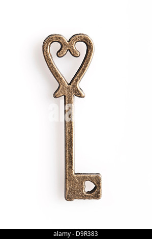 ornate antique golden skeleton key, isolated Stock Photo - Alamy