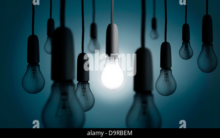 one light bulb lit up among many Stock Photo - Alamy