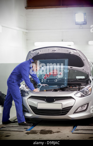 Small car with hood or bonnet open revealing engine Stock Photo - Alamy