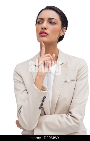 Serious-looking thoughtful smart perplexed woman solving riddle puzzle ...