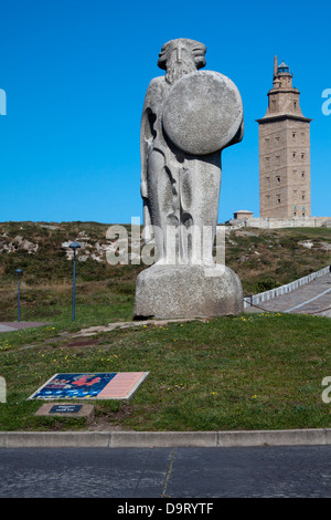 View of stone sculpture of Breogán with The Tower of Hercules (Spain ...