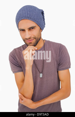 portrait of a thinking man with a beanie and a beard, maybe a rapper or ...