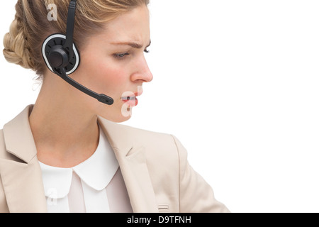 Frowning call center agent Stock Photo - Alamy